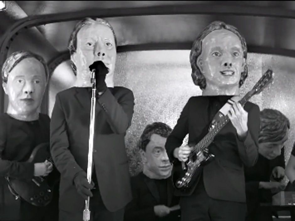 Arcade Fire would like its giant papier-mâché‎ bobblehead mask back ...