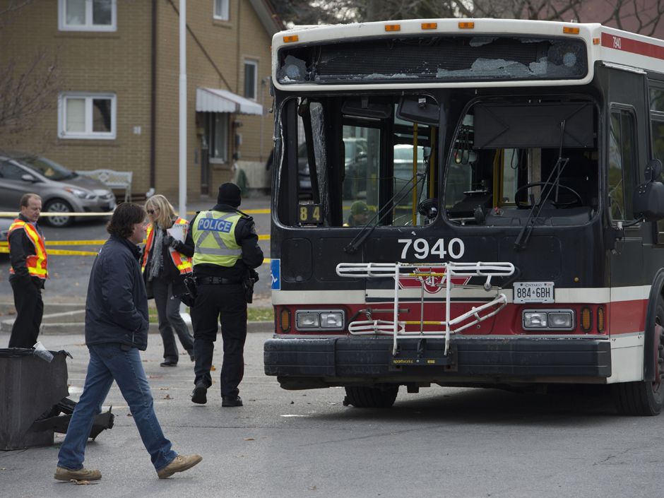 One dead after TTC bus collides with car then crashes into bank in west ...