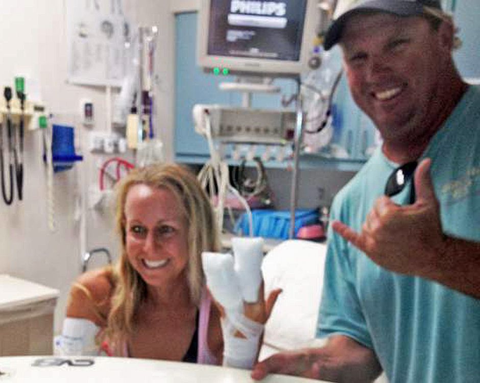 Shark pulling surfer out to sea stopped by man who grabbed its dorsal ...