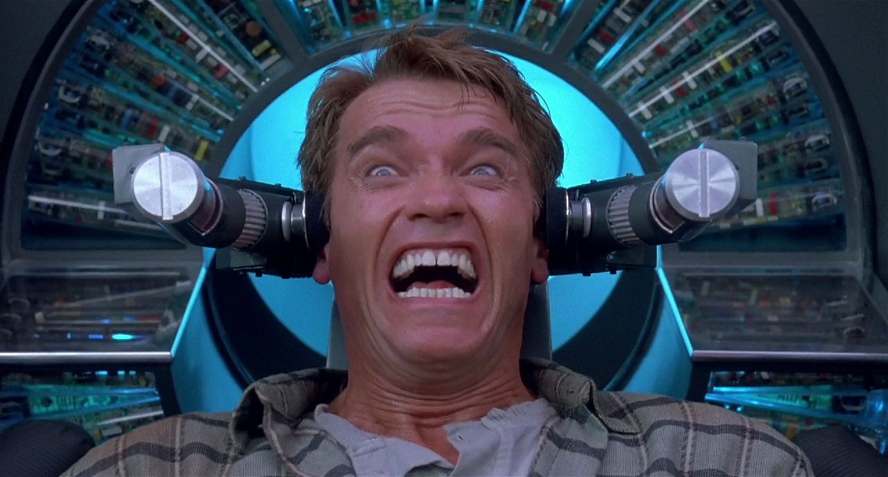 Total Recall's cartoonish comedy still separates it from the action ...