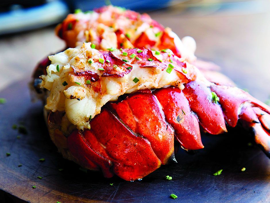 Slather hot grilled lobster with garlic butter in this traditional ...