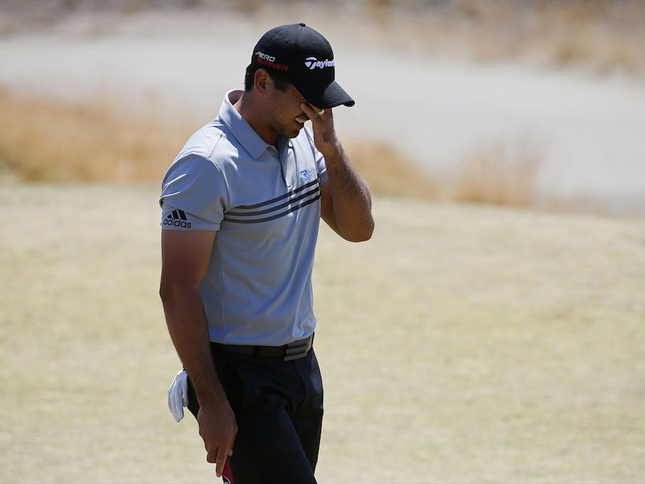 Jason Day, one round after collapsing on the course, fights through ...
