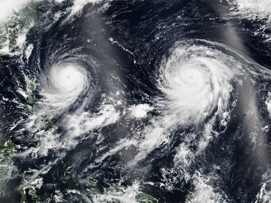 See enthralling images of the twin typhoons currently churning the ...