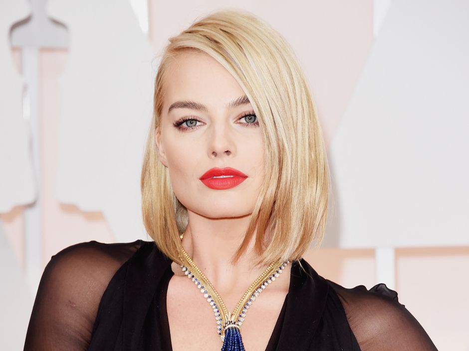 Margot Robbie confirms secret wedding to Tom Ackerley, shows off ...