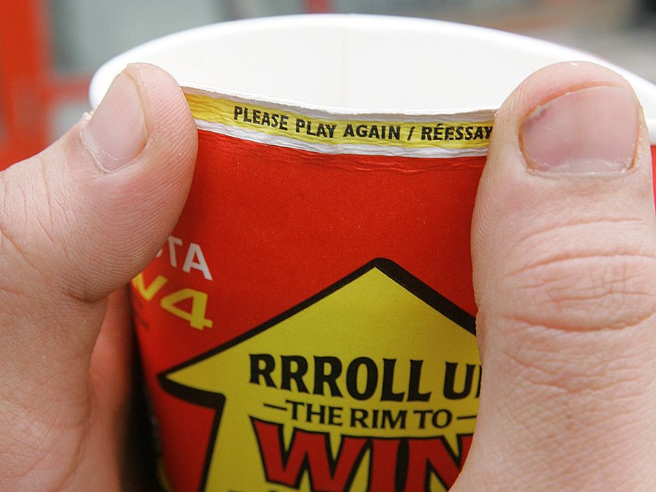 'Roll up the rim to lose': Man charged with stealing boxes of Tim ...