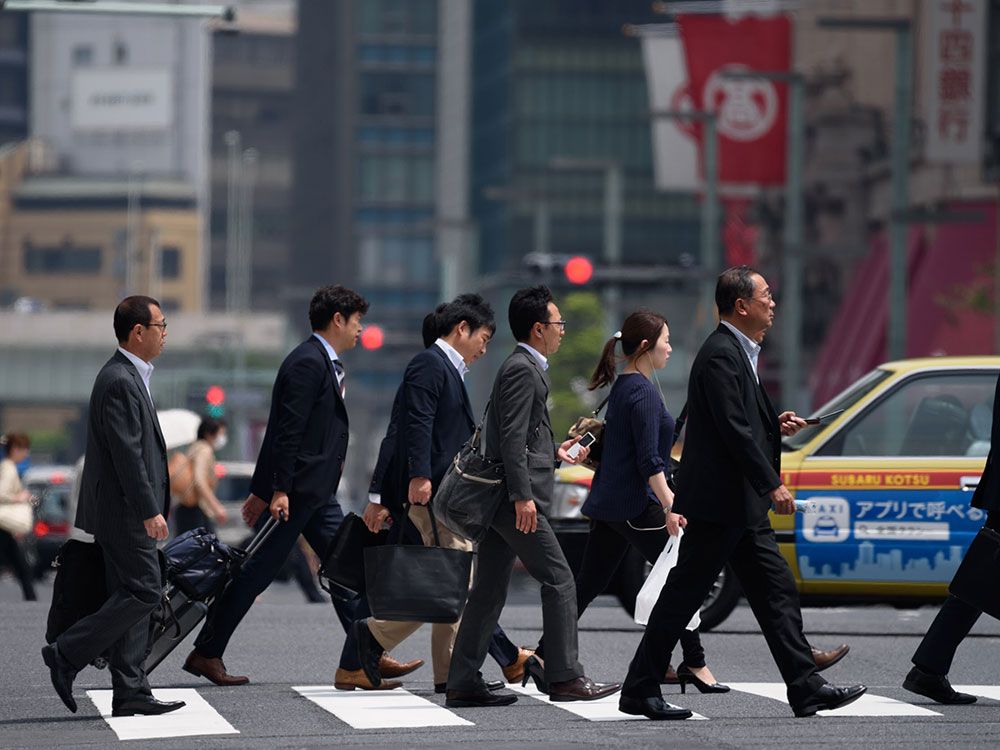 Young Japanese reporter works herself to death, dies with cellphone in ...