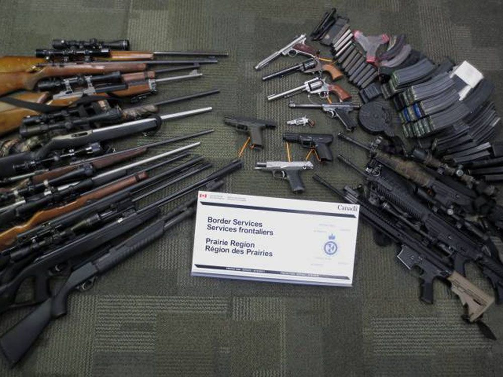 American couple charged after 24 undeclared guns seized at Alberta ...