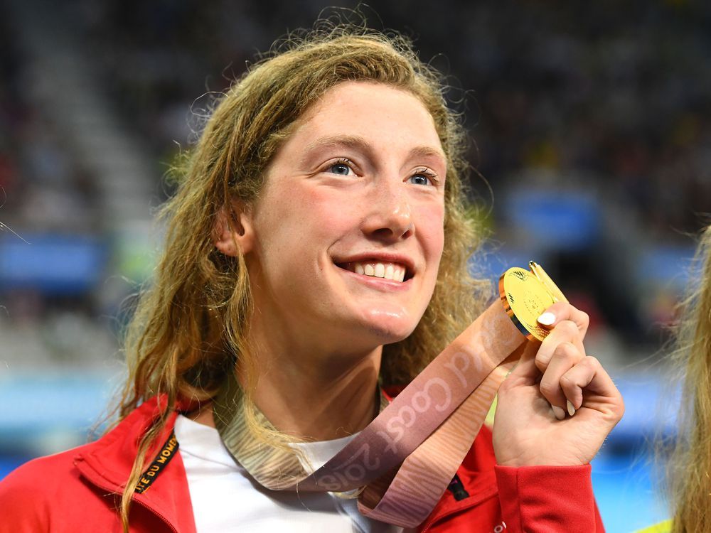 Canadian swimmer Taylor Ruck wins 200m freestyle gold in record time at ...