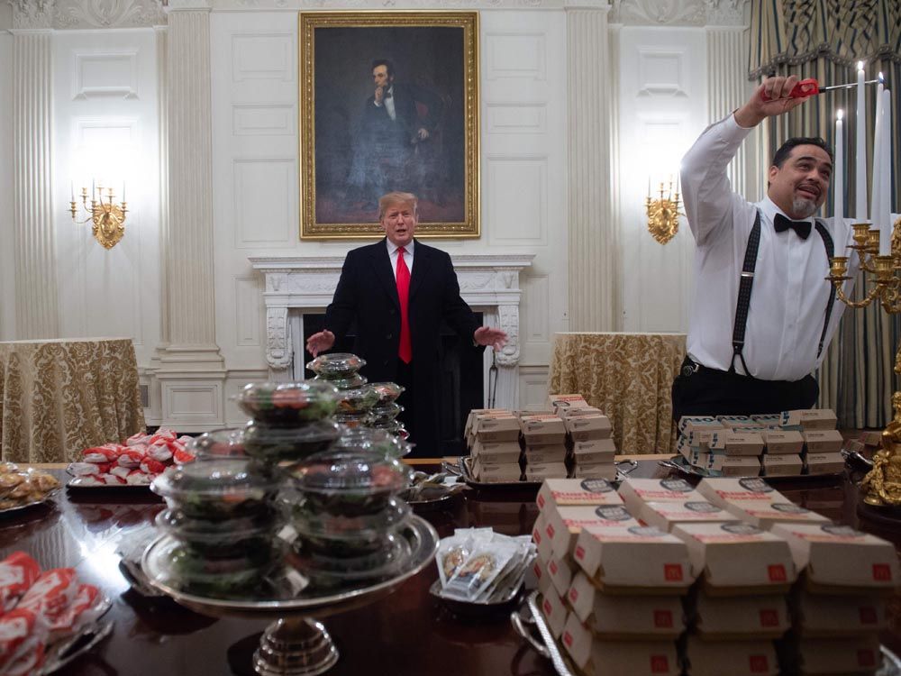 Photos: The strange juxtaposition of Trump lording over fast food on ...