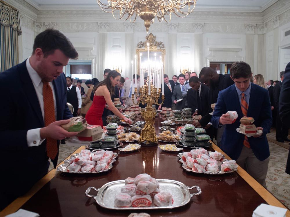 Photos: The strange juxtaposition of Trump lording over fast food on ...