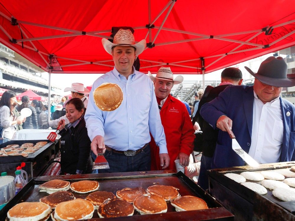 Scheer flips pancakes, appeals for more votes on Calgary Stampede ...