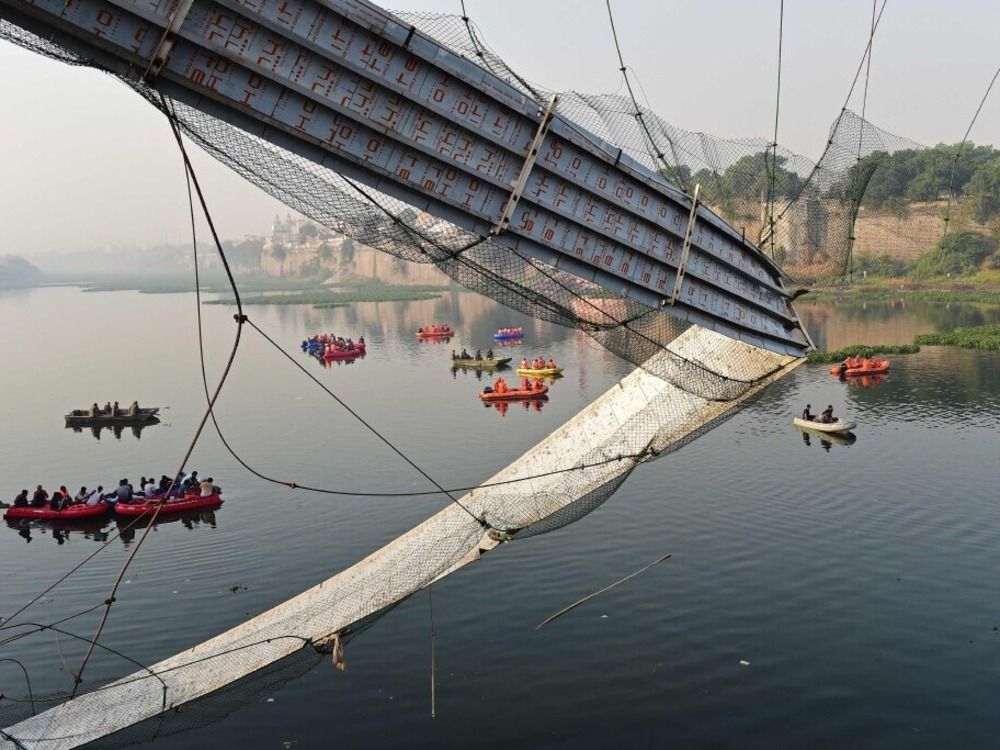A look at the 143-year-old suspension bridge that collapsed in India ...