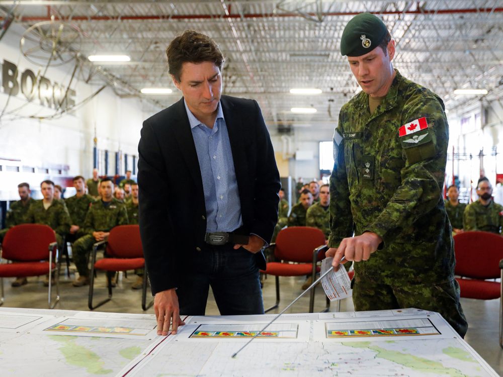 Trudeau briefed in Edmonton as dozens of Alberta wildfires burn out of ...