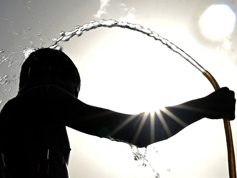 Nearly 100 die as India struggles with a sweltering heat wave ...