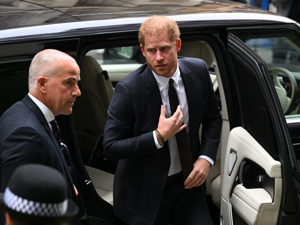 Prince Harry appeared to choke back tears on day two of hacking trial ...