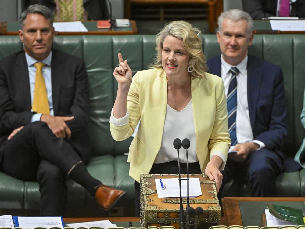 Australia proposes new laws to detain potentially dangerous migrants ...