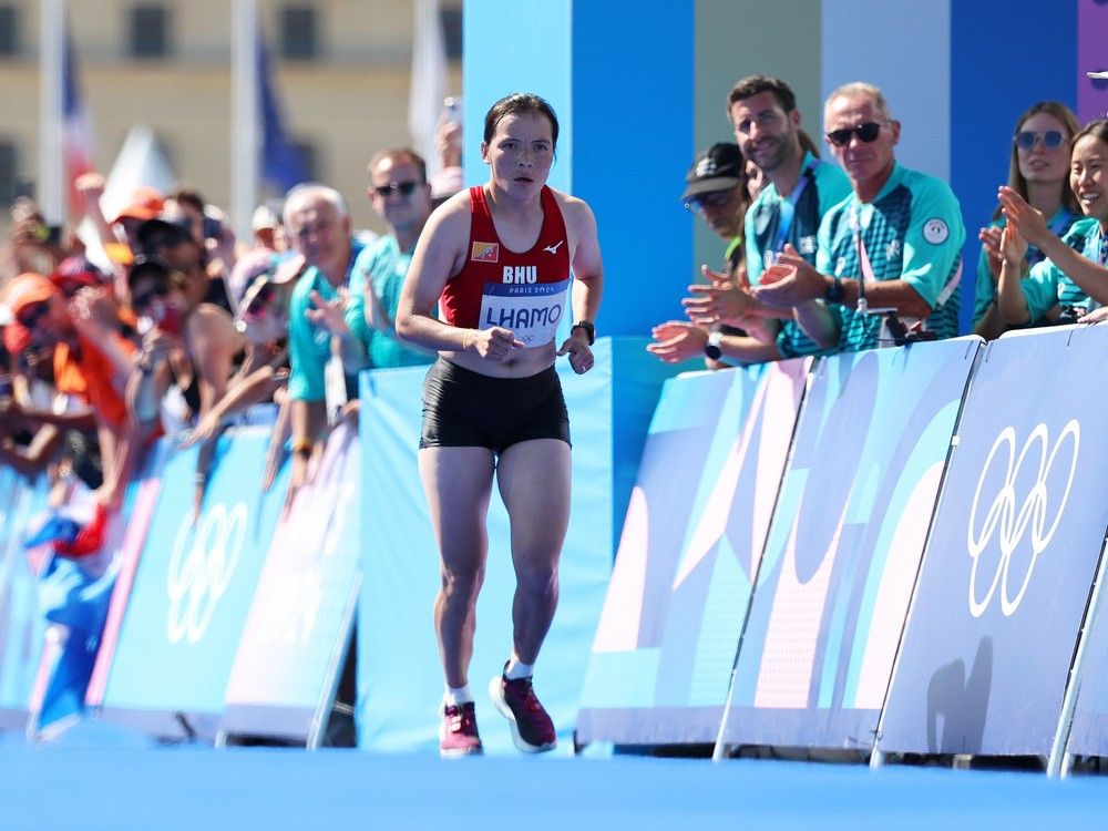Hassan completes Olympic triple with marathon gold; Paris rallies ...
