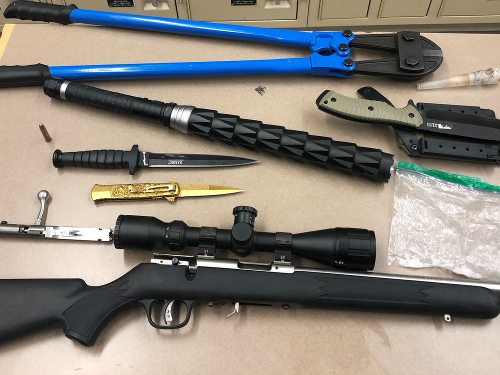 Two people charged with weapons offences following traffic stop ...