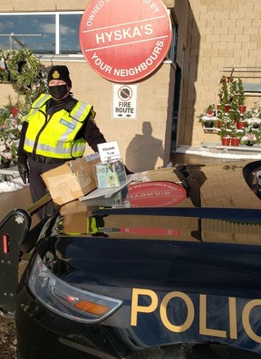 Overflowing with generosity; 13th annual OPP Auxiliary Unit's 'Stuff a ...
