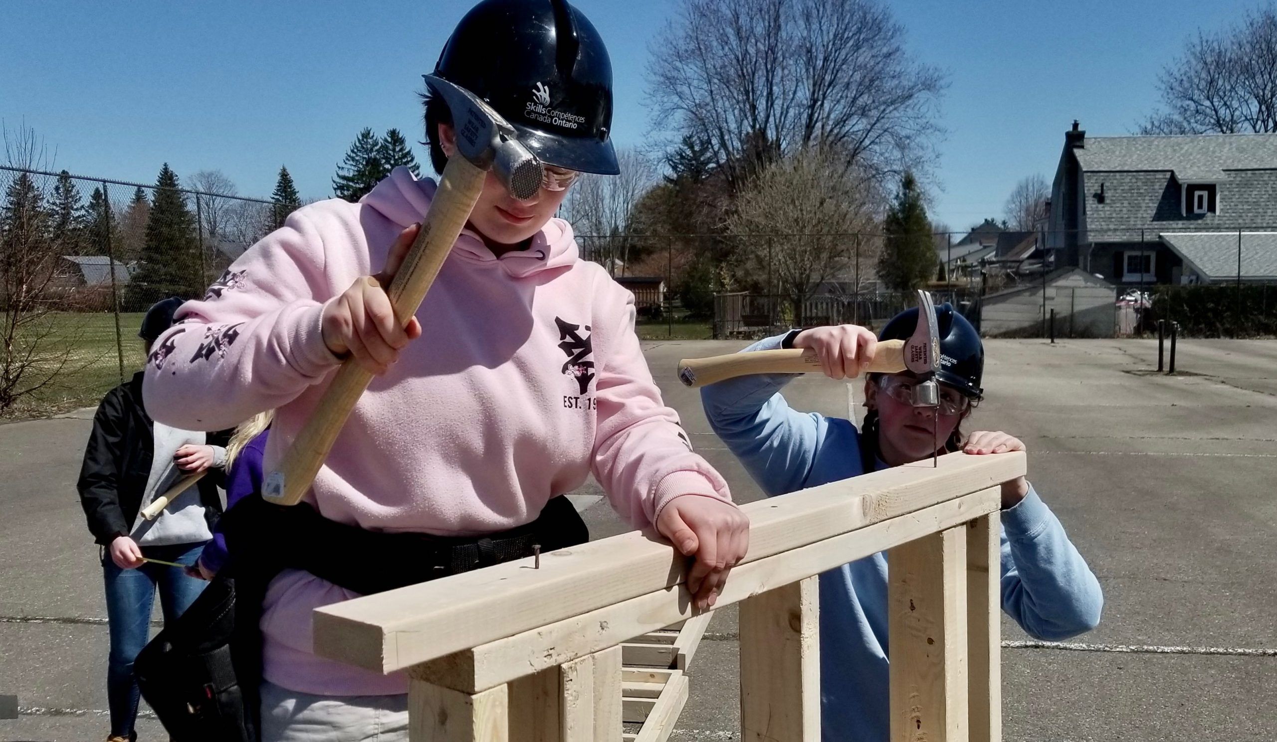 Local students win gold, silver in house-building skills competition ...