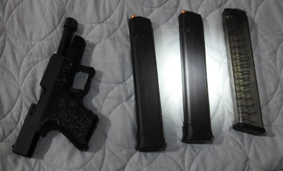 Loaded 'ghost gun,' 3D printers used to make them seized by police ...