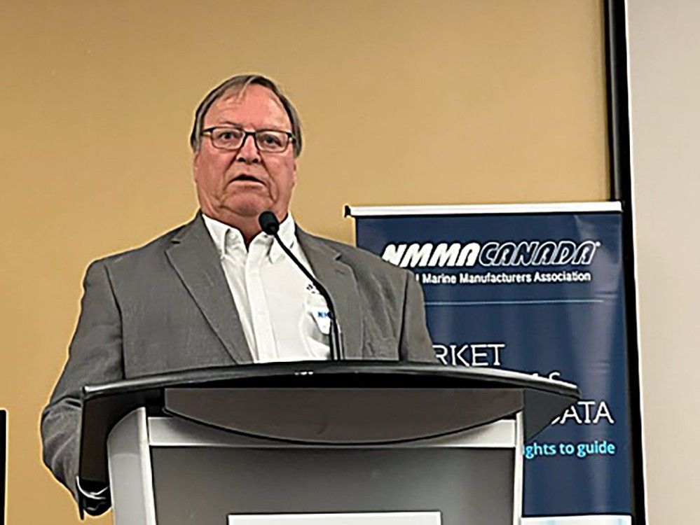 Bill Connor, president of MetalCraft Marine and Stanley Boats, receives ...