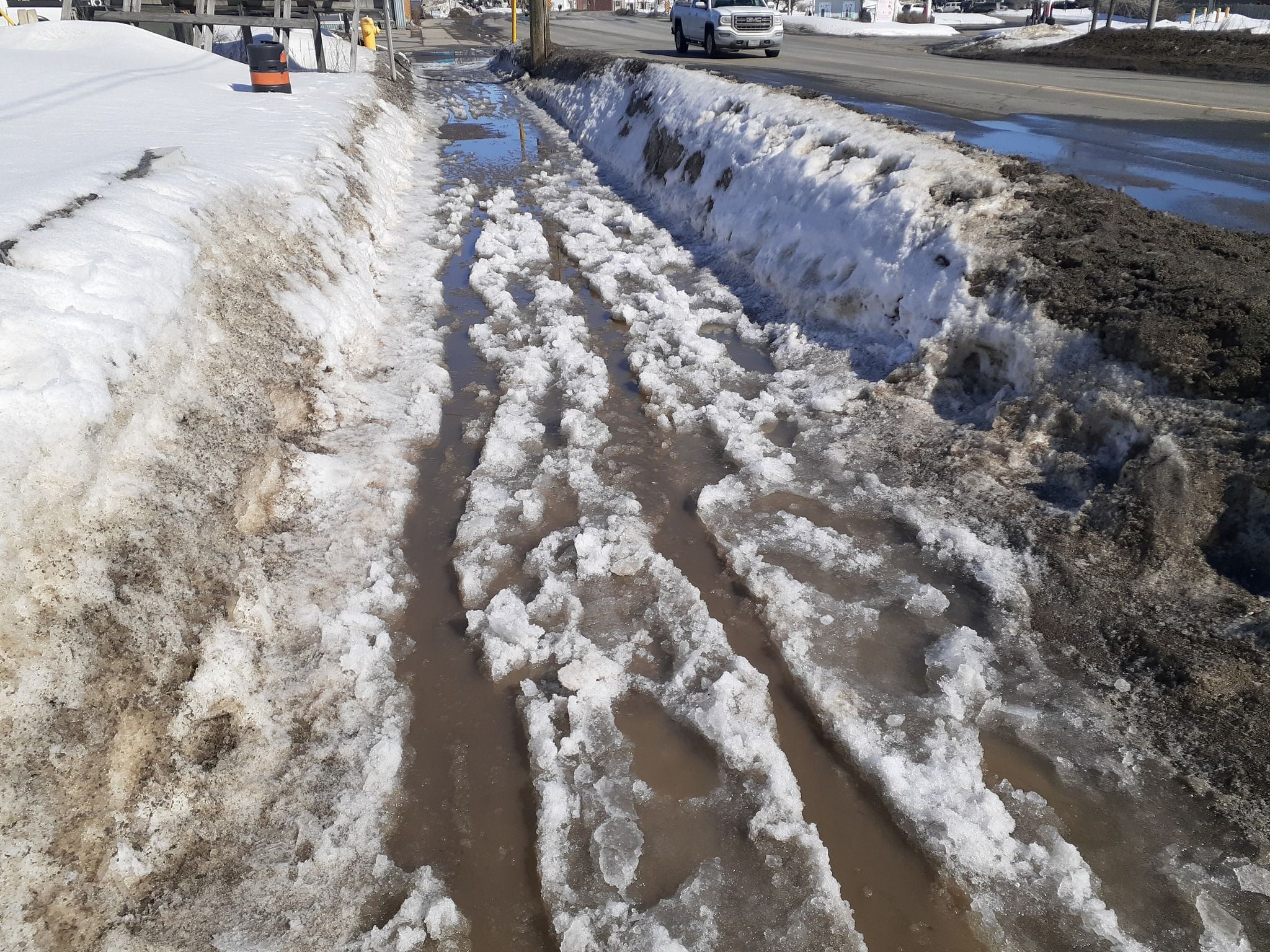 Column: Our sidewalks need to work for everyone in all seasons ...