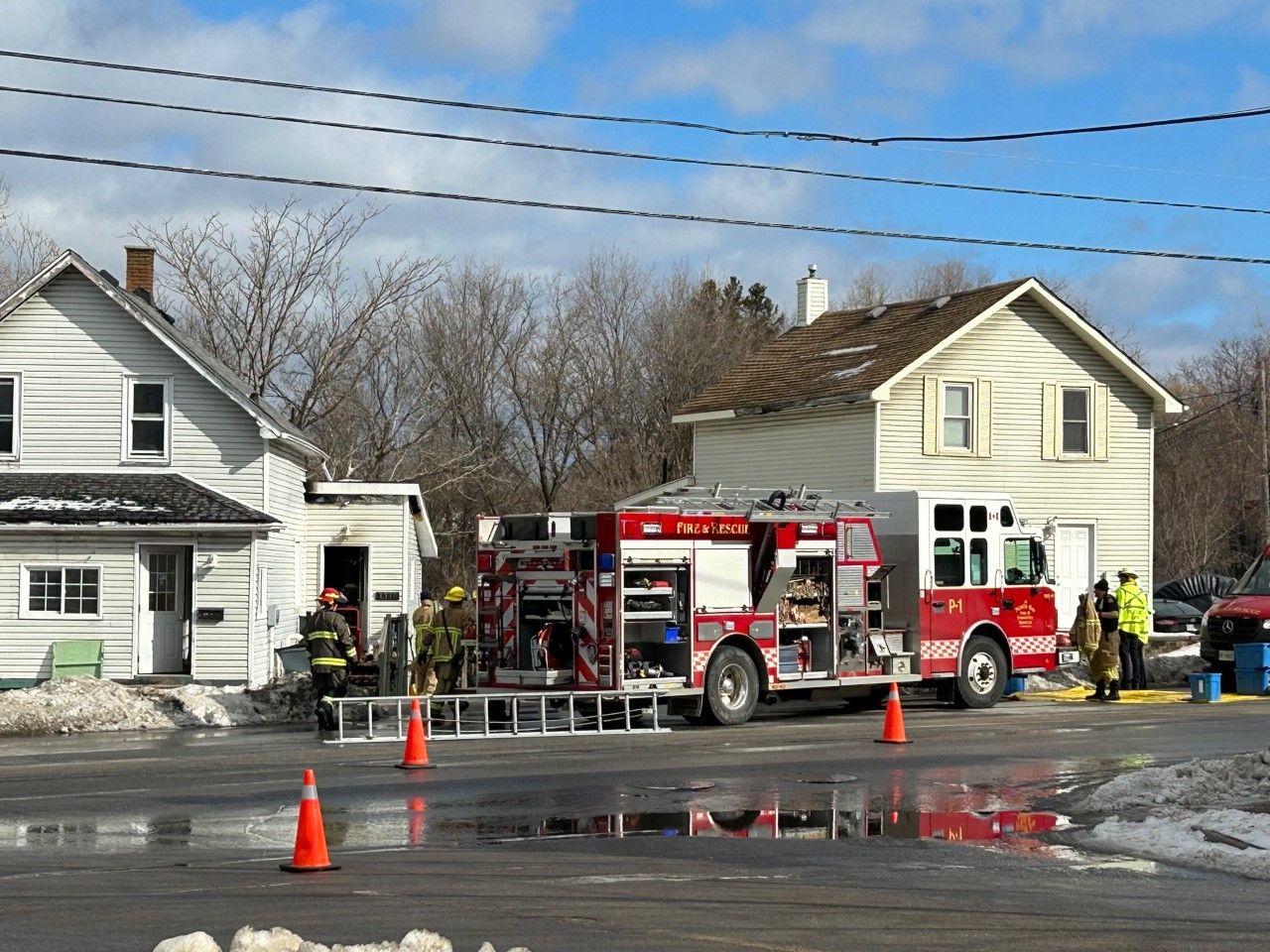 Fire crews arrive at fire in less than three minutes; rescue dog from ...