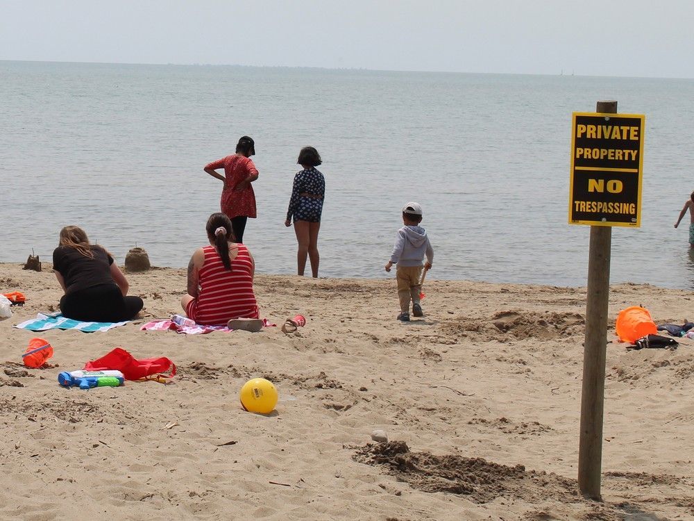 'No trespassing' signs don't deter beachgoers on long weekend ...