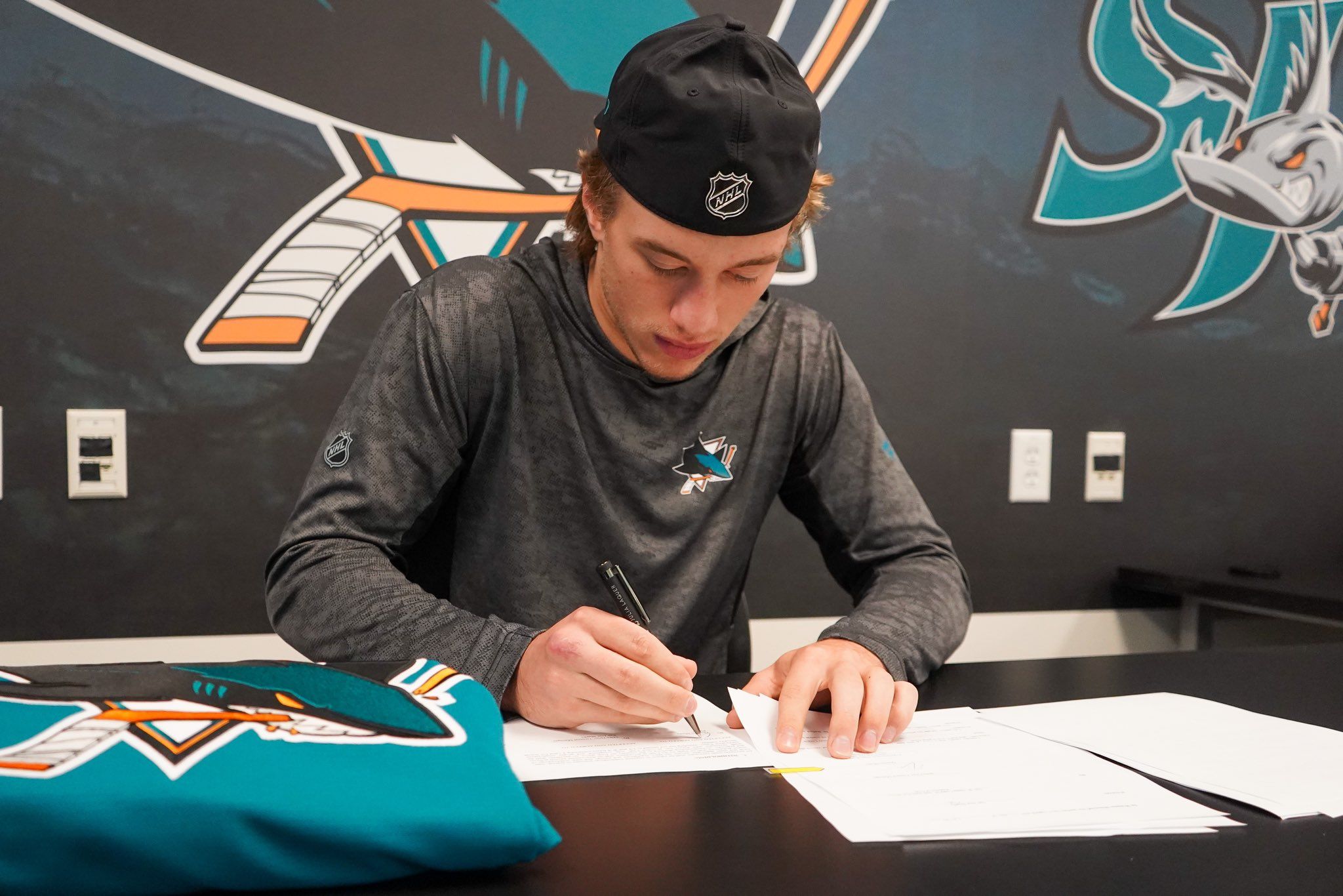 Musty signs with Sharks, remains in camp after latest round of cuts ...