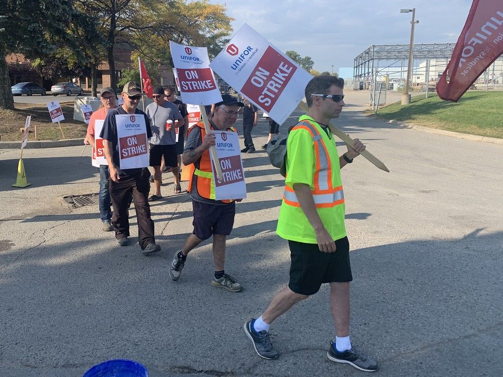 Galvanizing plant workers walking a picket line | Brantford Expositor