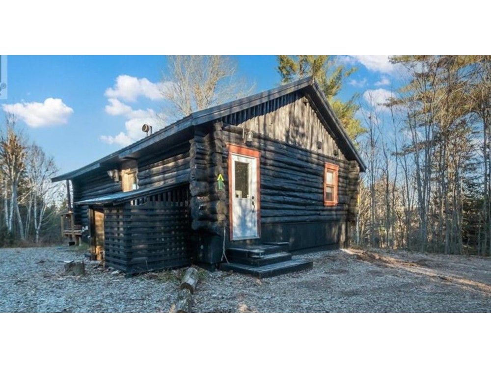 Dream home: A lakeside log cabin with cottages | Telegraph-Journal