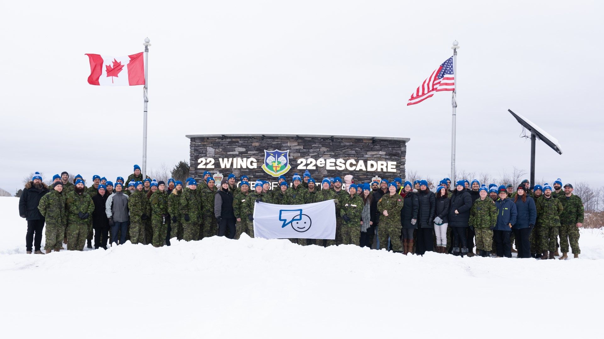 Members of 22 Wing take part in Let’s Talk Day flag raising ceremony ...