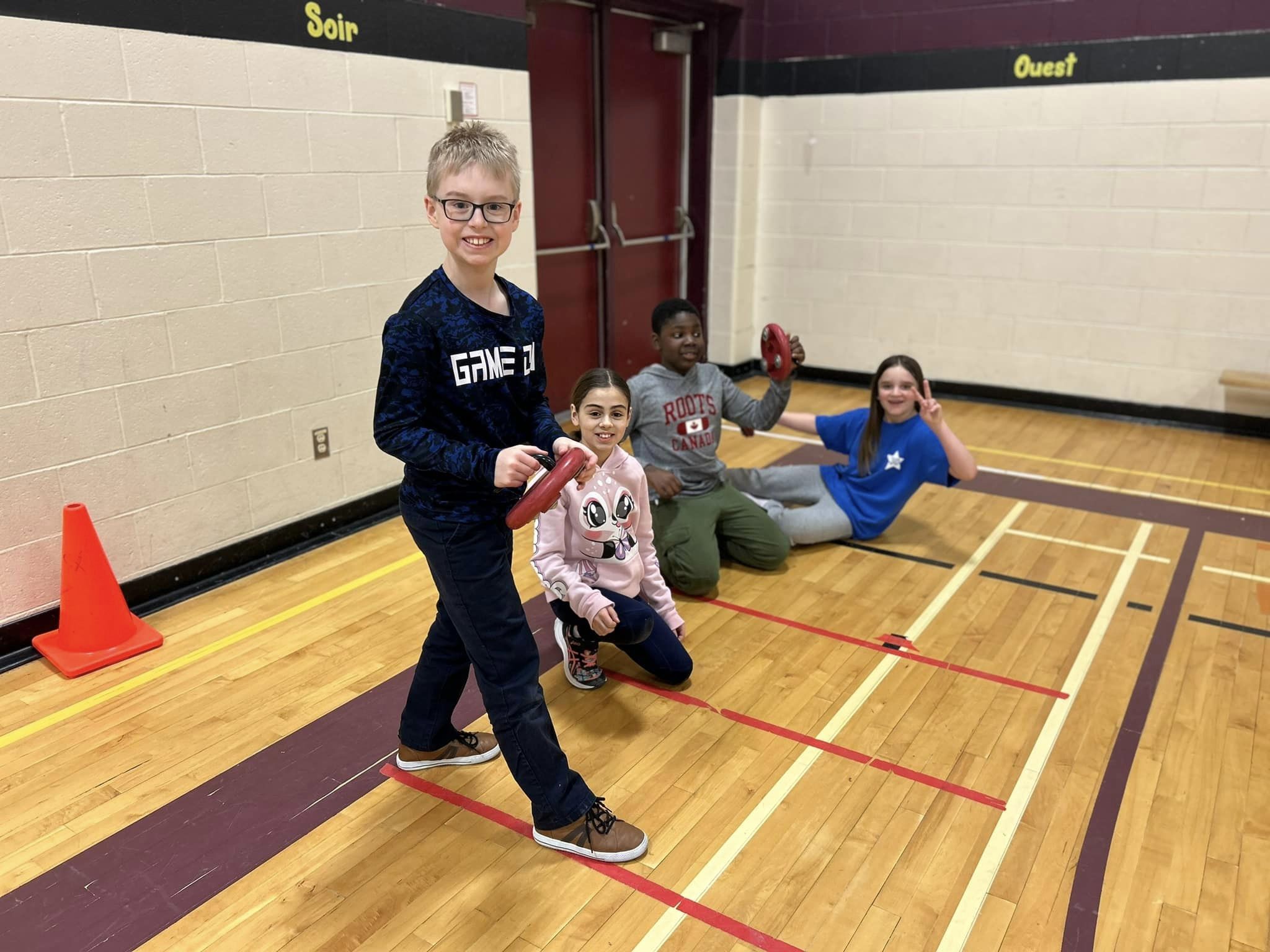Photo gallery: Ecole Felix-Ricard students have fun learning to curl ...