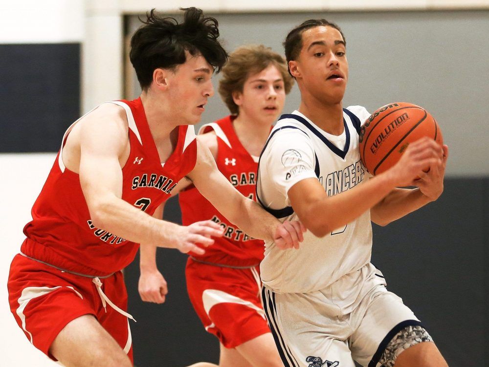 Lancers repeat as LKSSAA basketball champions | Chatham Daily News