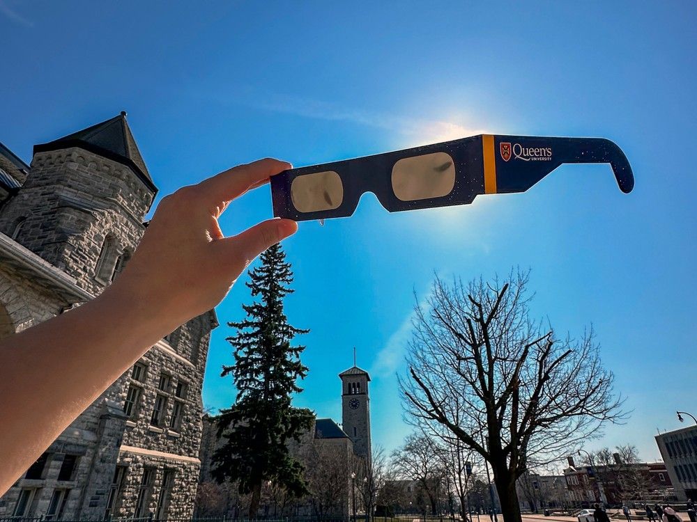 Queen's partners with groups to distribute glasses for viewing eclipse ...