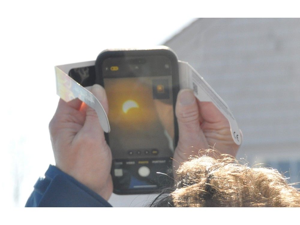 Moncton eclipse viewers cheer as sunny sky goes dark | Telegraph-Journal