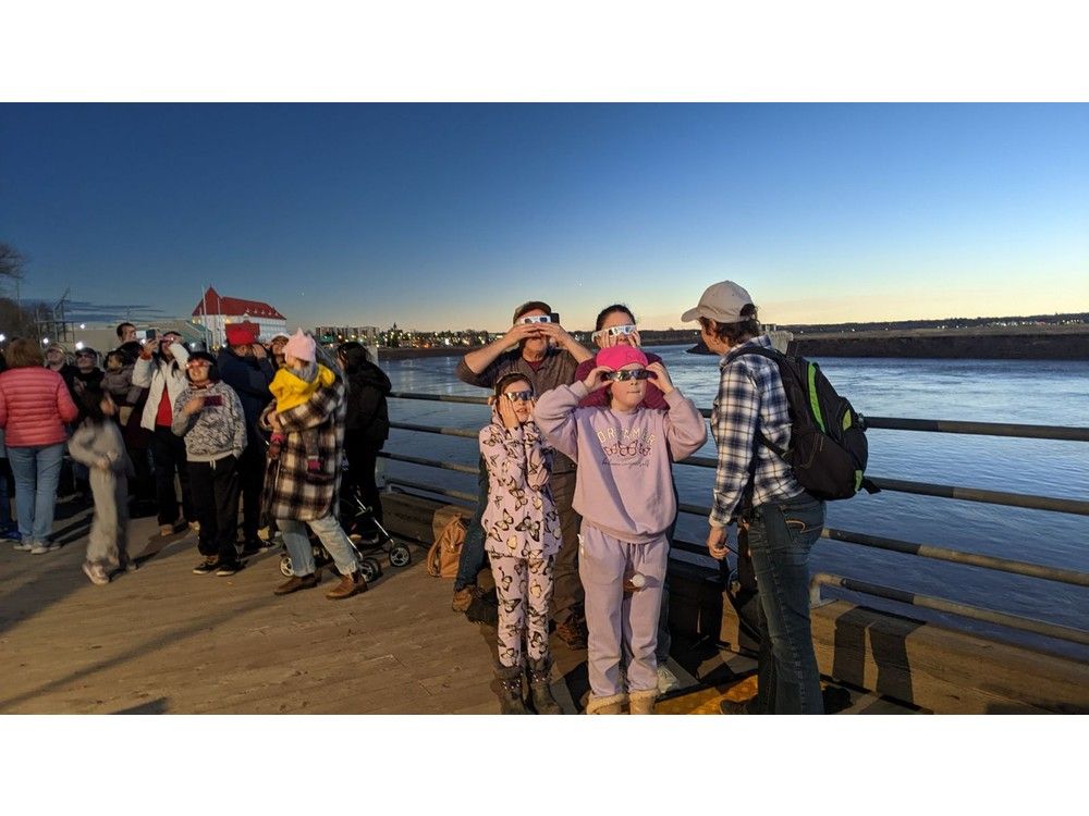 Moncton eclipse viewers cheer as sunny sky goes dark | Telegraph-Journal