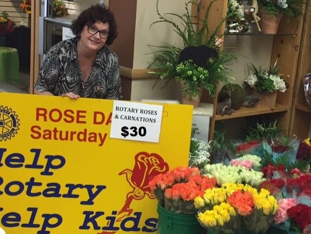 Rotarians sell roses to raise funds for children's charities | North ...