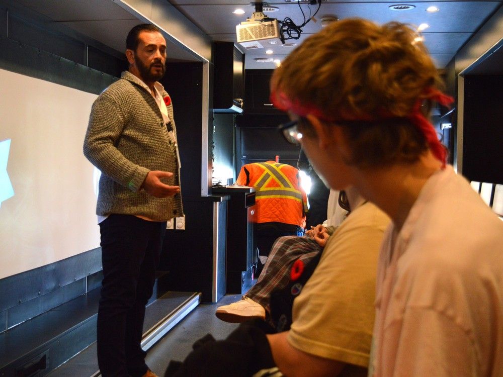 Local students board Tour for Humanity bus to talk about human rights ...