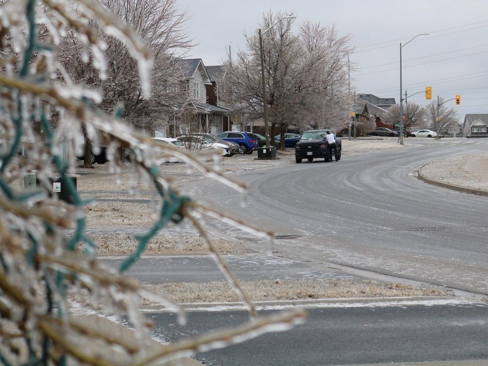 Freezing rain results in power outages and a dozen highway collisions ...