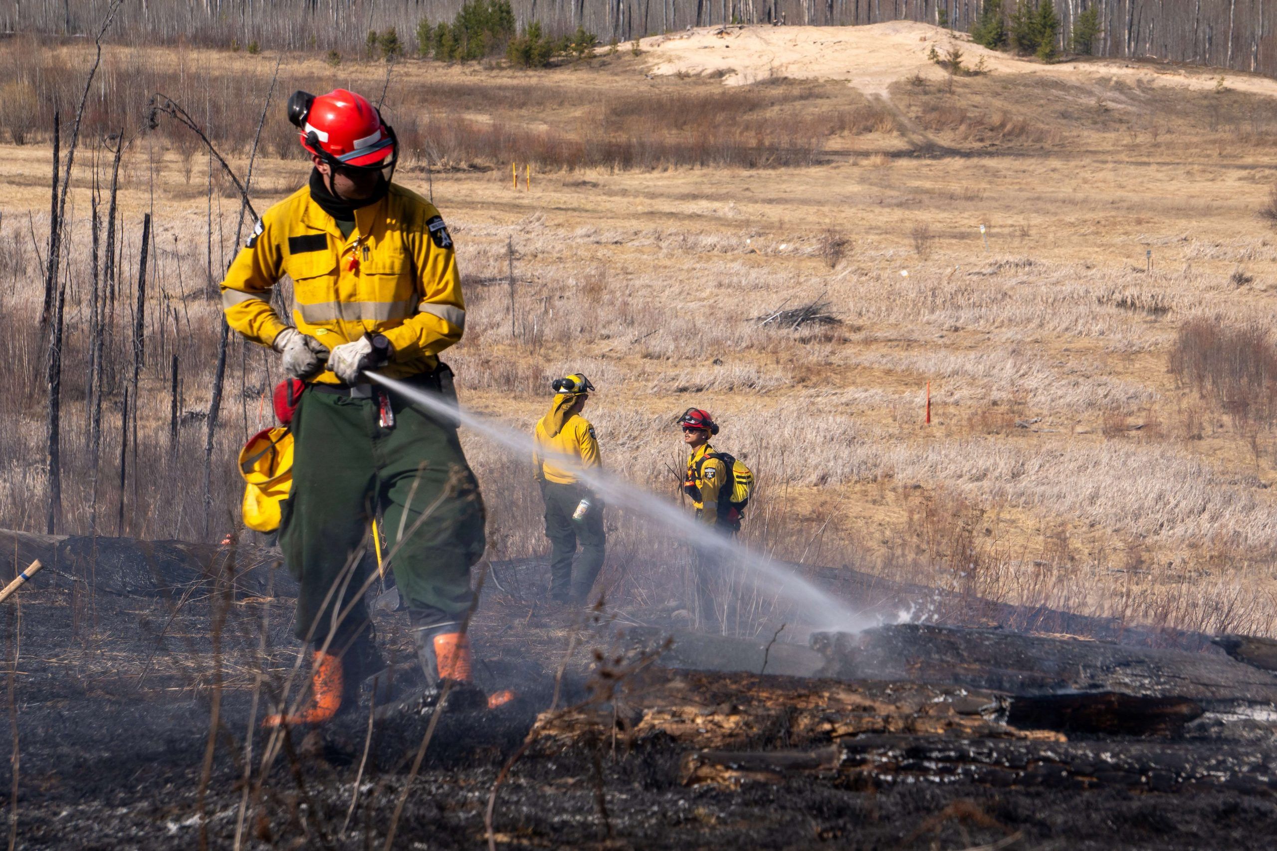 Conklin evacuation warning ends as wildfire moves away from community ...