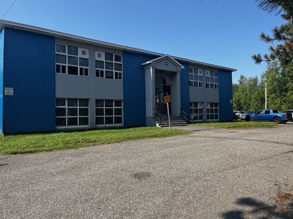 Minister defends decision to close school, saying it's up to the DEC ...