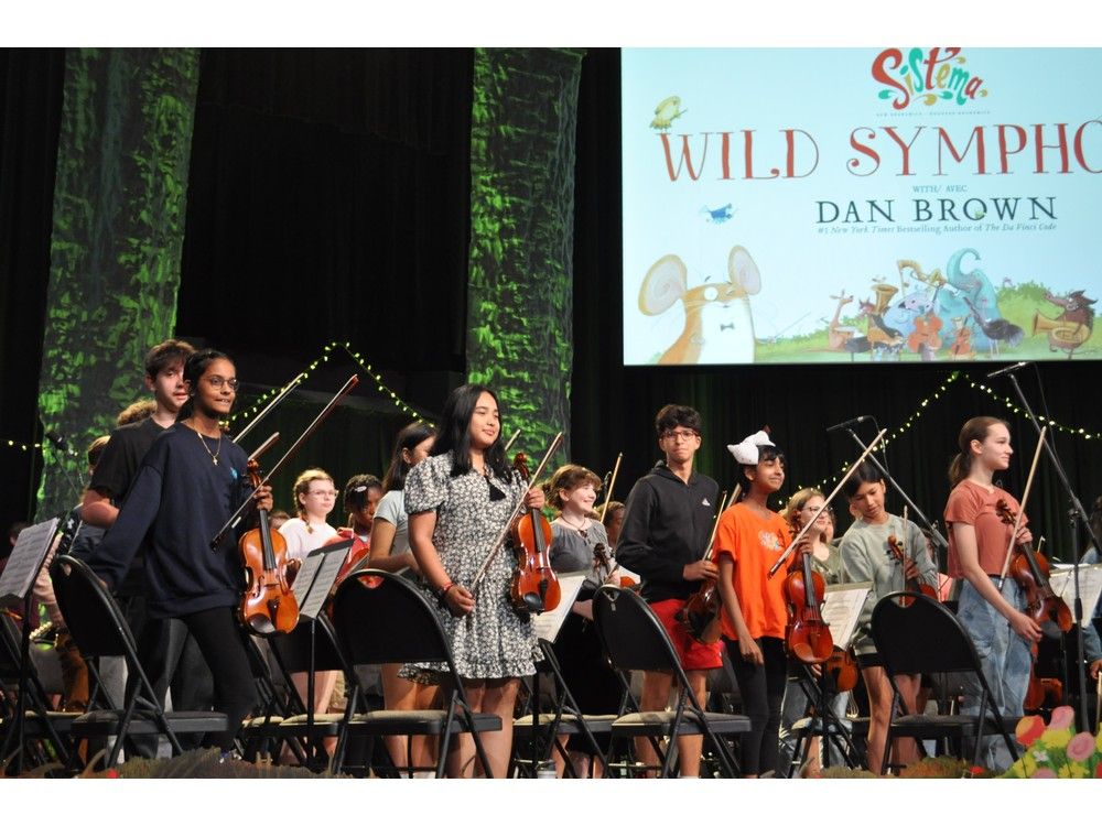 Viola player Daniel Milliea of Elsipogtog prepares for spotlight ...