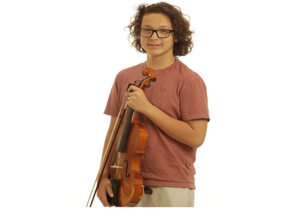 Viola player Daniel Milliea of Elsipogtog prepares for spotlight ...