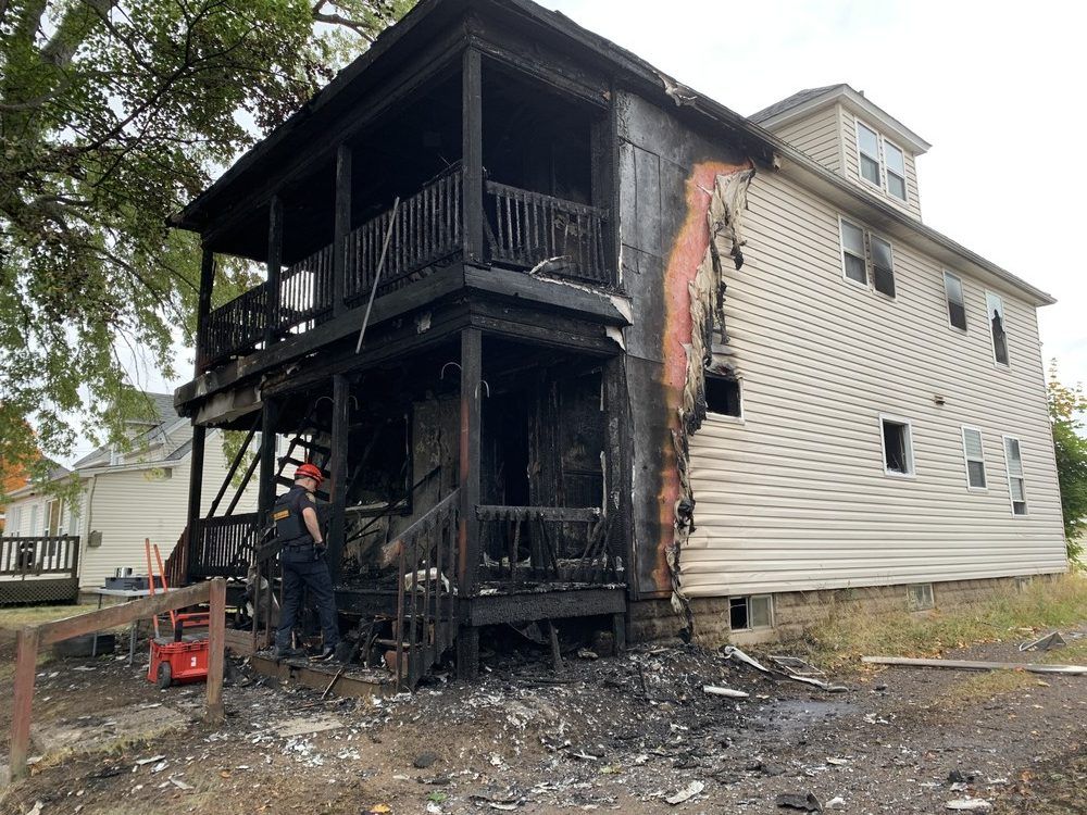 Two firefighters injured while rescuing victims of Moncton house fire ...