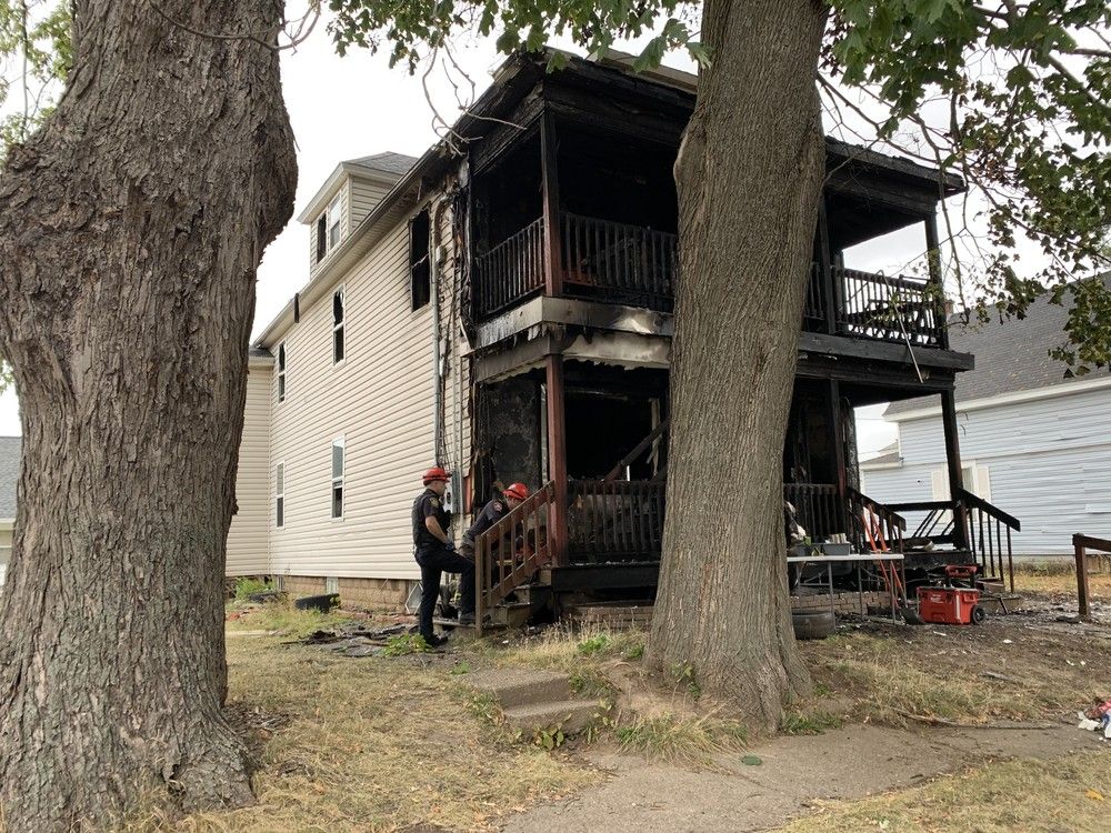 Two firefighters injured while rescuing victims of Moncton house fire ...