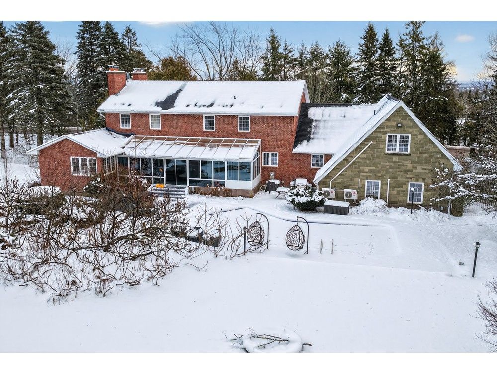 Dream Home: Two-storey home with guest suite and in-ground pool ...