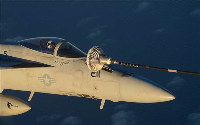 Photos- U.S. fighter jets gas up courtesy of RCAF Polaris refueller ...