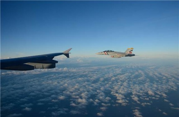 Photos- U.S. fighter jets gas up courtesy of RCAF Polaris refueller ...